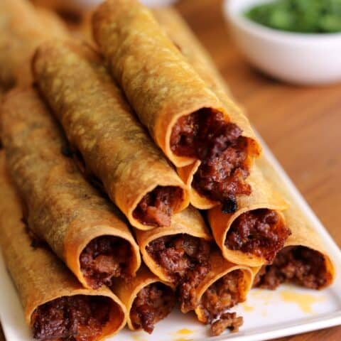 Beef and Cheese Baked Taquitos - Kinda Healthy Recipes